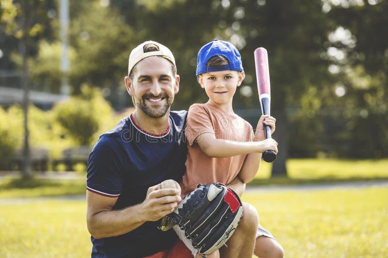 Father and Son Playing Baseball in Sunny Day at Public Park Stock Photo ...