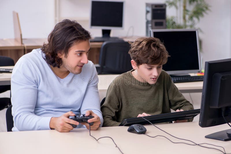 Father and Son Playing Computer Games Stock Photo - Image of desktop ...