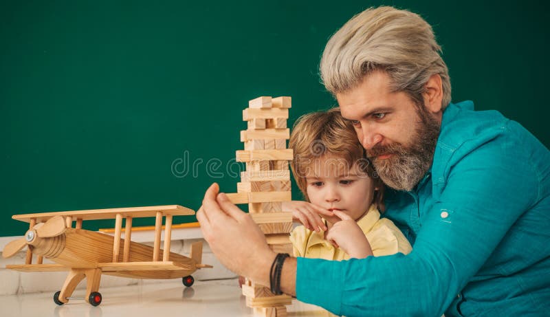 Father and Son Playing Stacking Wood Blocks Jenga Games for Meditation ...