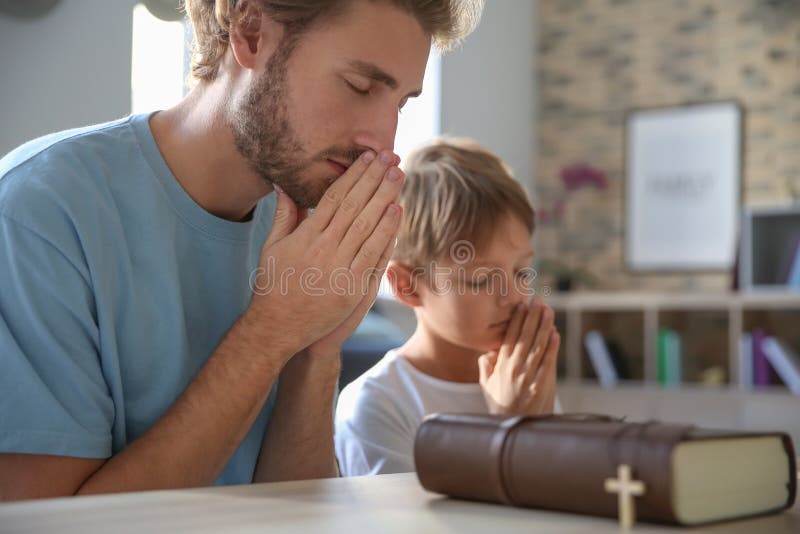 Father with Son Praying at Home Stock Photo - Image of praying, silence ...