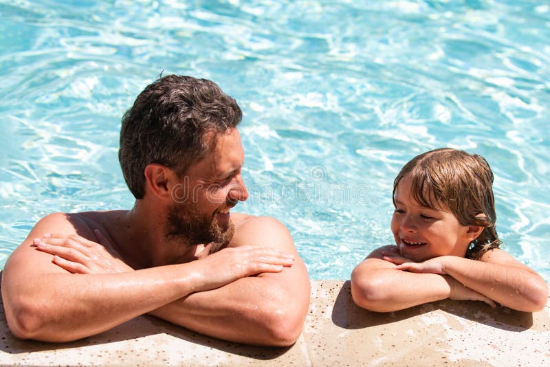 Father and Son Relax in Swimming Pool. Pool Resort. Summer Weekend ...