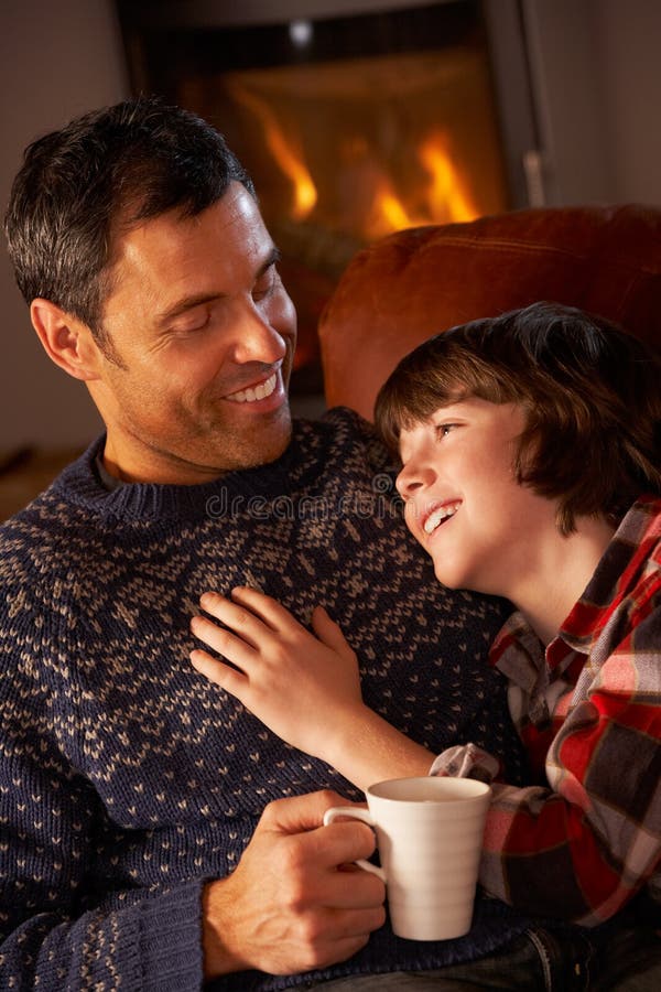 Father and Son Relaxing with Hot Drink Stock Photo - Image of drinking ...