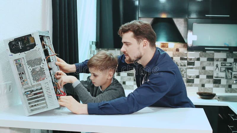 Father and Son Repair a Computer. Stock Footage - Video of installing ...