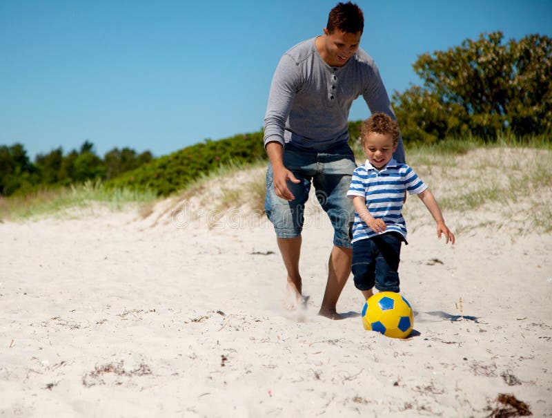 Father and Son Run after the Ball Stock Photo - Image of nature ...