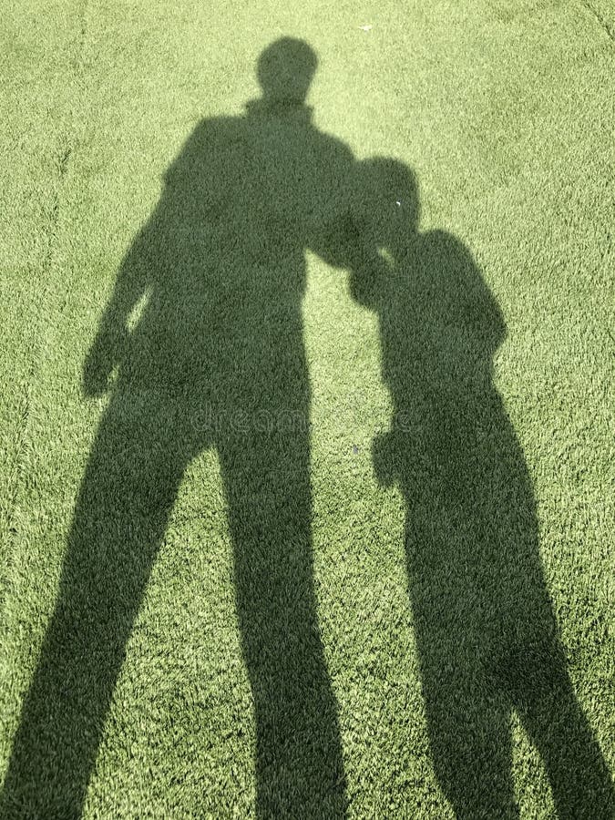 Father and son. stock image. Image of shadow, family - 94343177