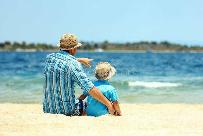 Father and Son Sit by the Sea Stock Image - Image of outdoor, happy ...