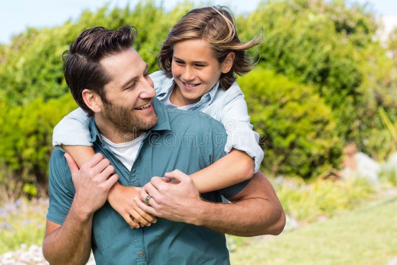 Father and Son Smiling at Each Other Stock Image - Image of childhood ...