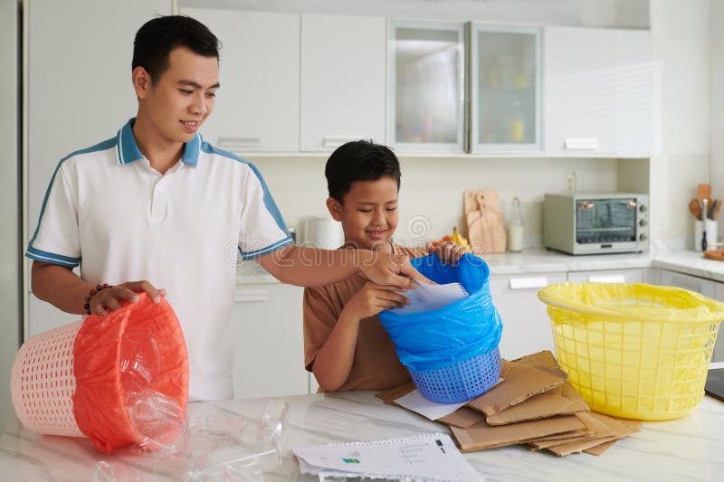 Father and Son Sorting Waste Stock Photo - Image of sort, father: 320734670