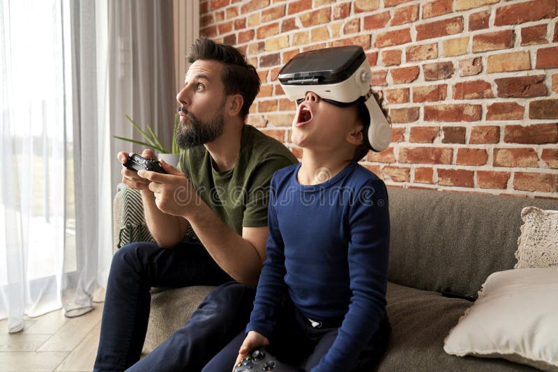 Dad and Son Using Technology at Home Stock Image - Image of home ...