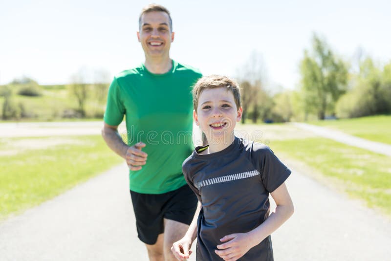 Father with Son Sport Running Together Outside Stock Photo - Image of ...