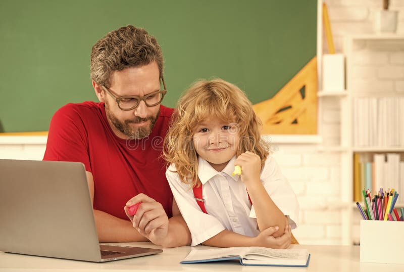 Father and Son Study in Classroom with Laptop, School Stock Photo ...