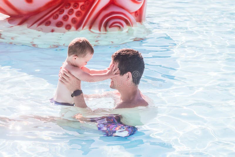 Father with Son in the Swimming Pool. Father`s Day. Parent Stock Image ... Father with Son in the Swimming Pool. Father`s Day. Parent Stock Image ...