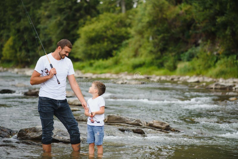 Father and Son Together Fishing Stock Image - Image of caucasian, love ...
