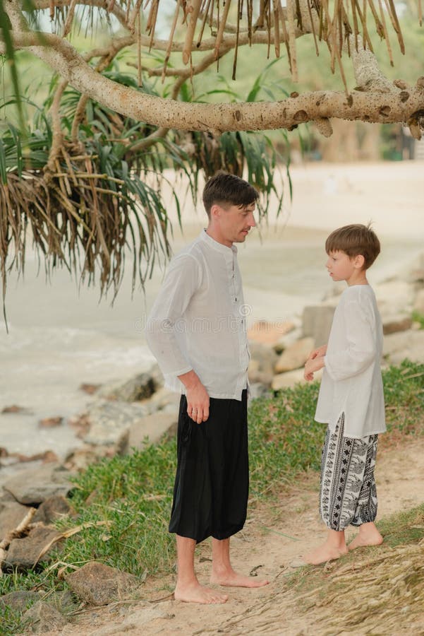 Father and Son Under a Tree in the Indian Pants Stock Photo - Image of ...