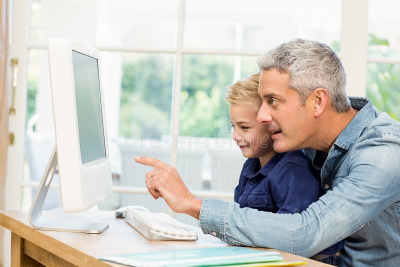 Father and Son Using the Computer Stock Photo - Image of fair ...