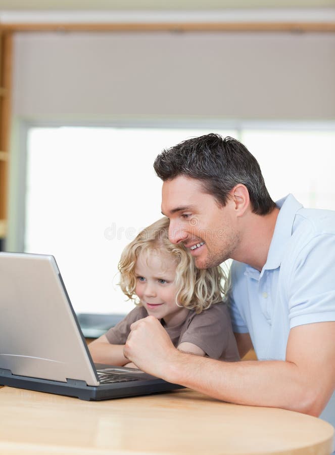 Father son computer stock image. Image of house, little - 1627007
