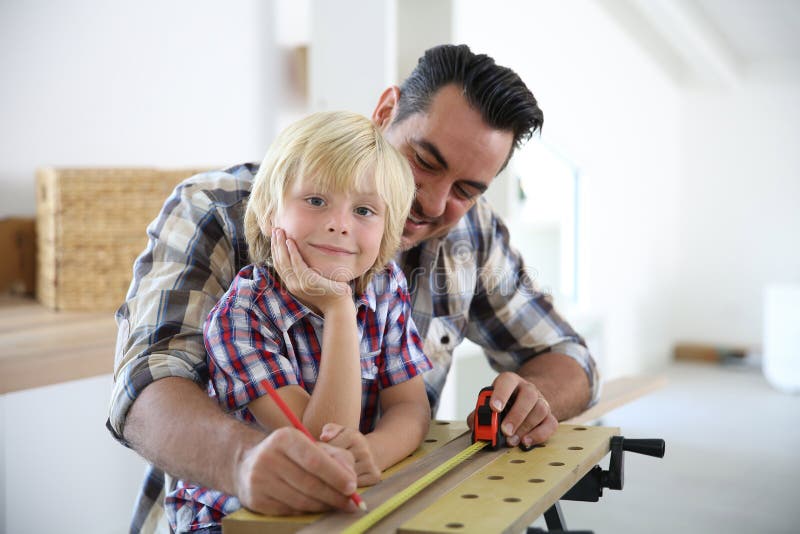 Father with Son Working on Home Improvement Stock Photo - Image of ...