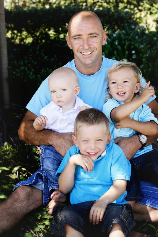 Father and sons stock image. Image of infant, childcare - 7419055
