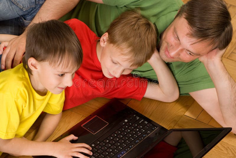 Father and Children with Computer Stock Photo - Image of child, surfing ...