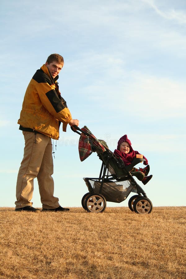 Father with stroller stock image. Image of carriage, smile - 957847