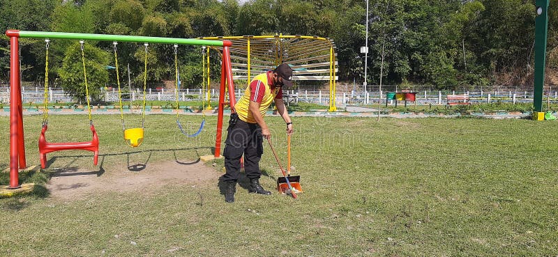 A Father is Sweeping the Garden Editorial Photography - Image of picnic ...