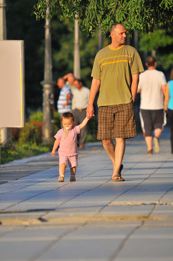 Father Takes Child for Walk Stock Photo - Image of walk, trip: 6838252