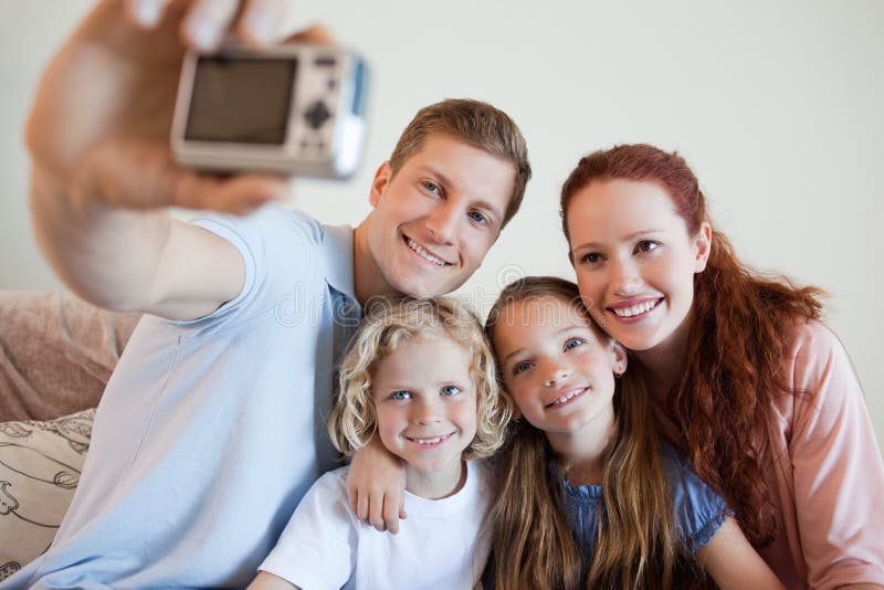 Father Taking a Family Picture Stock Image - Image of comfort, home ...