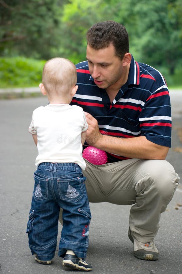 Father talking to his son stock image. Image of communicate - 13486709