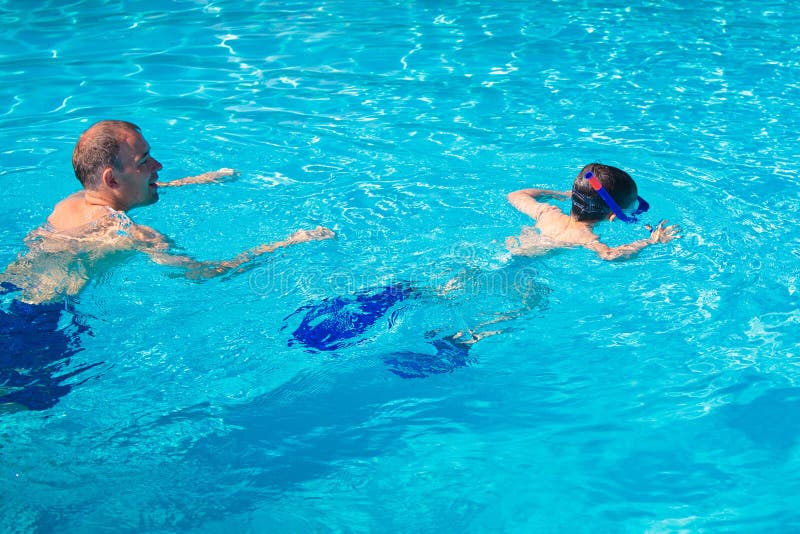 Parents with Children Playing in the Pool Editorial Image - Image of ...
