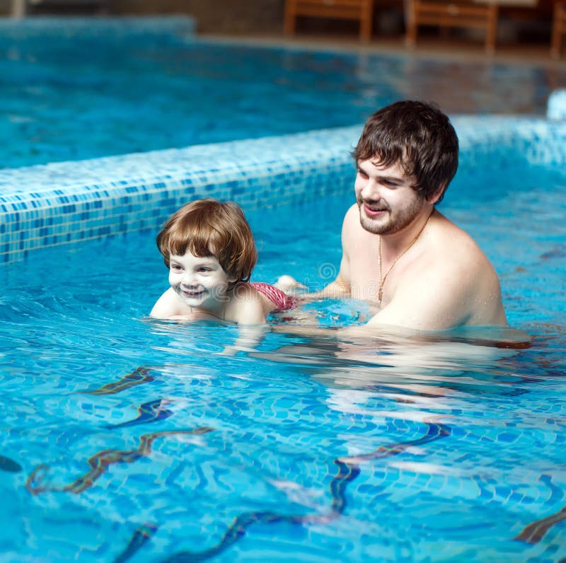 Father Teaches Son To Swim in the Pool Stock Image - Image of little ...