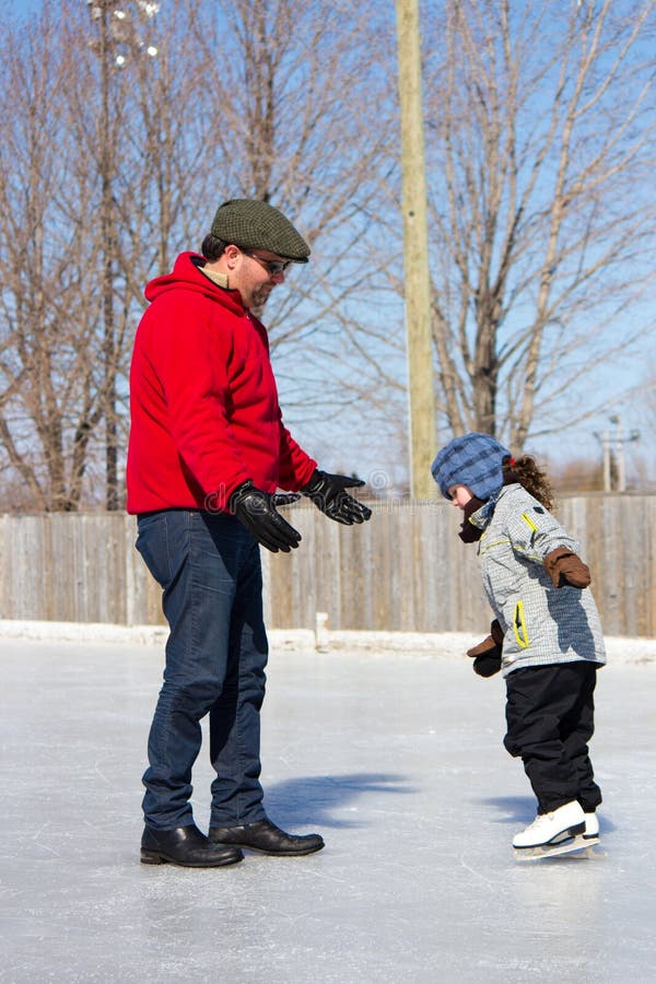 Father Teaching Son How To Ice Skate Stock Image - Image of years ...