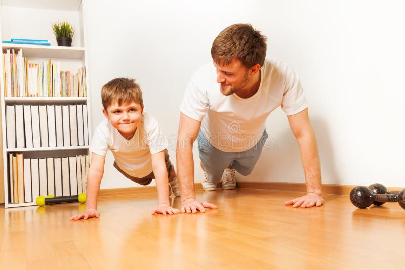 Father Teaching Kid Son Doing Push-ups Exercises Stock Photo - Image of ...