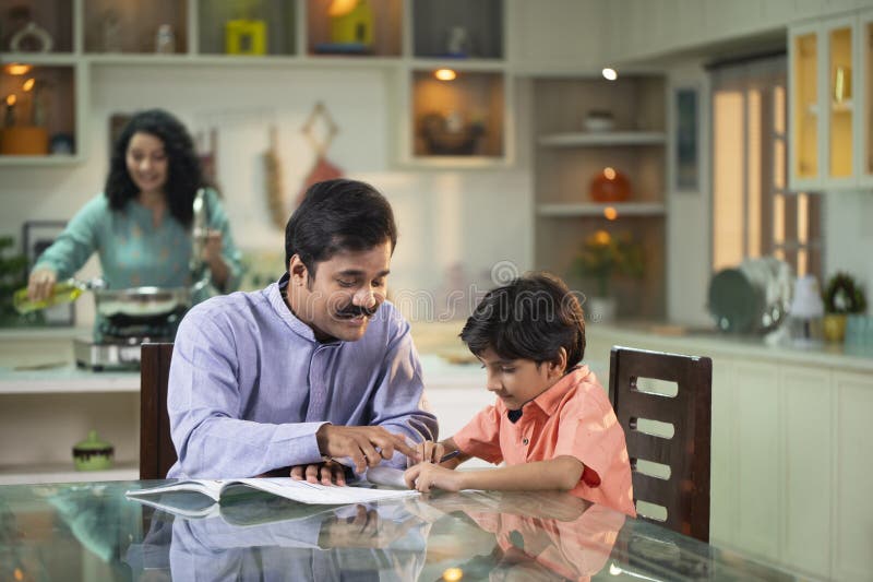 Father Teaching Son with Math Homework at Table Stock Photo - Image of happyface, solve: 325928280