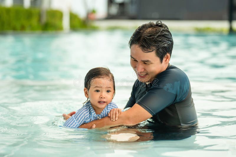 Father Teaching Toddler Baby Swimming in Pool Stock Image - Image of ...