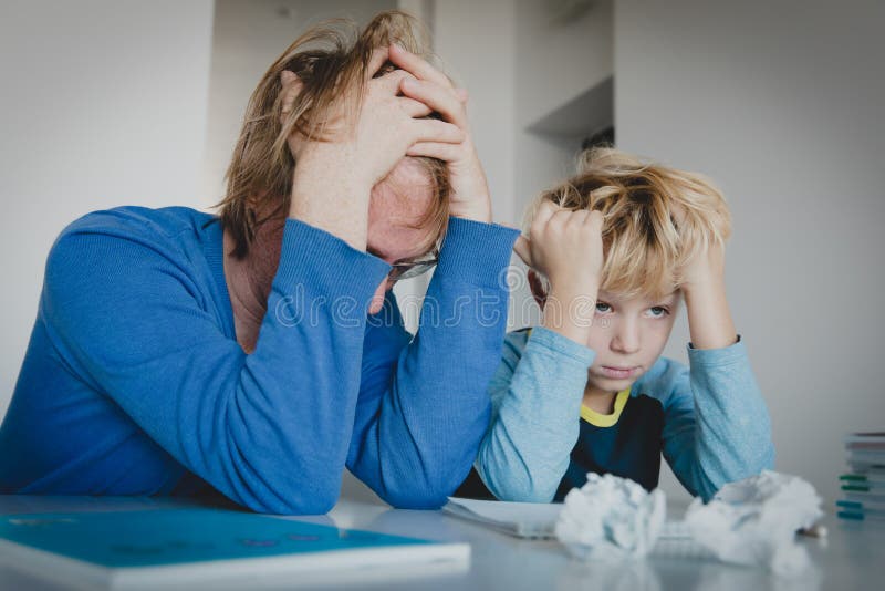 Father Tired of Doing Homework with Son, Difficult Learning Stock Image ...