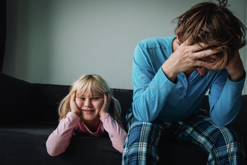 Father is Tired and Stressed while Daughter Smiles and Has Fun Stock ...