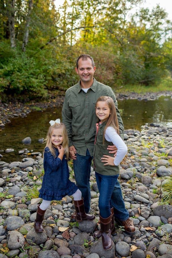 Father with Two Daughters stock photo. Image of lighting - 36058274