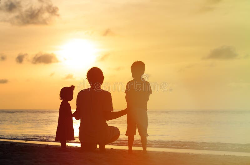 Father with Two Kids at Sunset Beach Stock Image - Image of daughter ...
