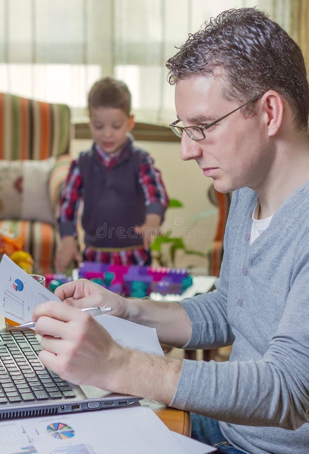 Father Working in Home Office and Son Playing Stock Photo - Image of ...