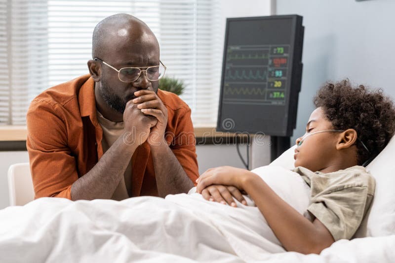 Father Worrying about the Health of His Son Stock Image - Image of ...