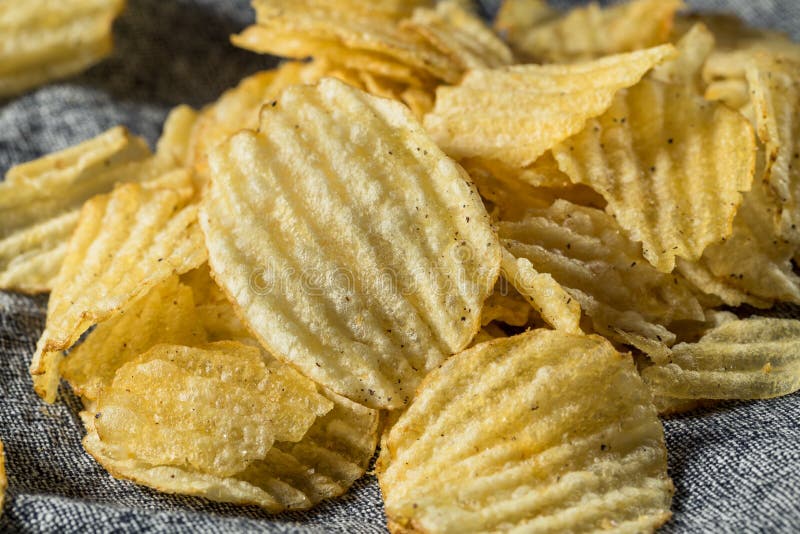 Fatty Ruffled Potato Chips stock image. Image of junk - 224108951