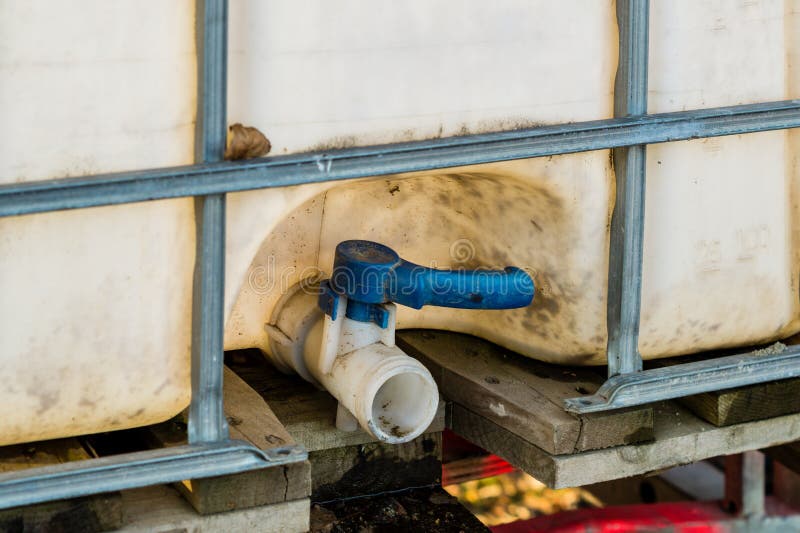 Faucet of a PVC barrel stock image. Image of hose, glass - 263902249