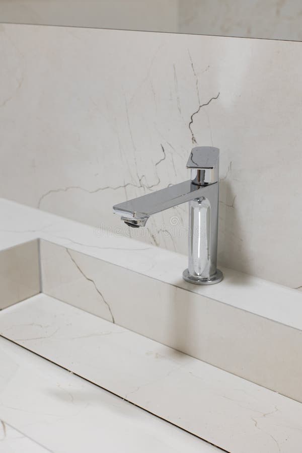 A Faucet of Steel Color in a Bathroom in a Modern Interior Stock Photo ...