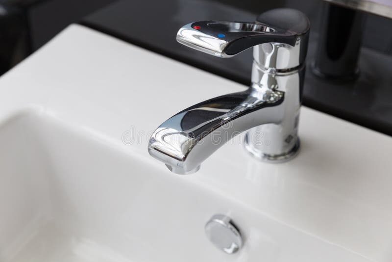 Faucet in toilet stock image. Image of sink, faucet, public - 67477171