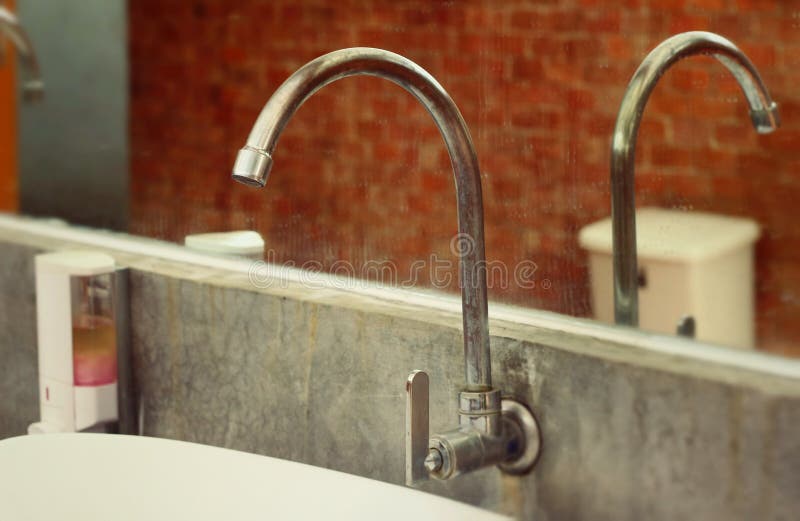 Faucet in toilet stock image. Image of shiny, valve, wash - 50460619