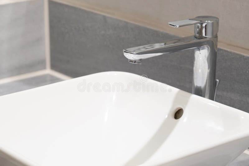 Faucet for Water and White Sink on Marble Counter Stock Photo - Image ...