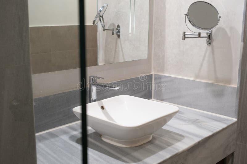 Faucet for Water and White Sink on Marble Counter Stock Photo - Image ...