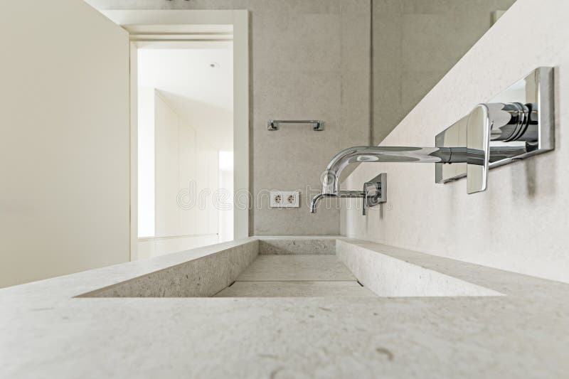 Faucets in a Modern Design Bathroom on a Cream Marble Sink Stock Photo ...