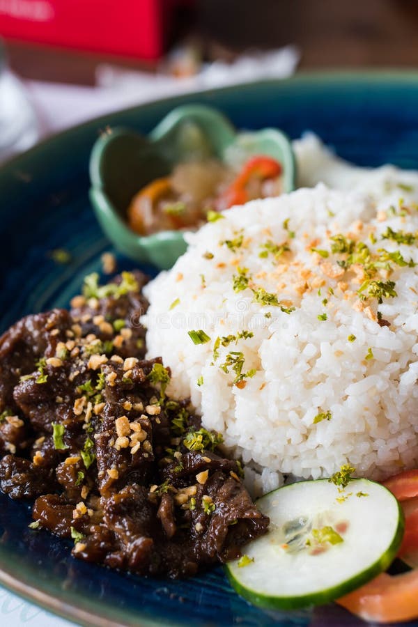 Beef Tapa with Garlic Rice and Egg on the Side Stock Photo - Image of ...