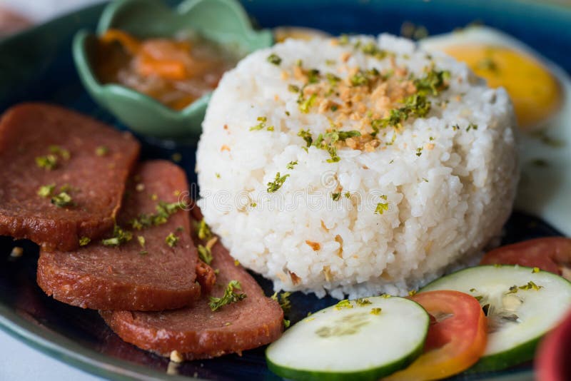 Processed Meat with Garlic Rice and Fried Egg on the Side Stock Photo ...